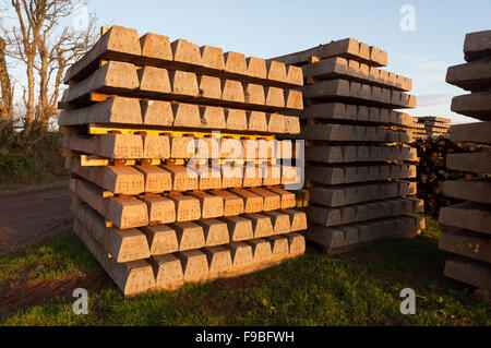 Stack of concrete railway sleepers on the ground Stock Photo - Alamy