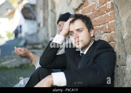 Jobless manager is on the street Stock Photo - Alamy