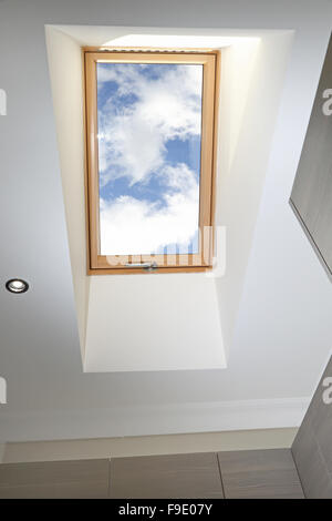 Window in a ceiling with blue sky and clouds, conceptual picture Stock ...