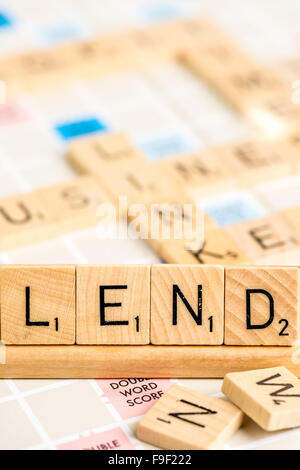 Scrabble board and tiles finance money concept England UK United ...