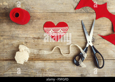 Red heart shape from felt in a white gift box with gypsophila or baby ...