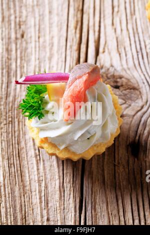 Canape - Pastry base with savory spread topping and salami Stock Photo ...