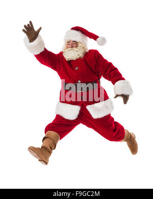 Happy Santa Claus running a race on an asphalt road at the finish line ...