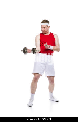 Funny weak man tries to lift a weight Stock Photo - Alamy