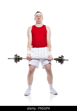 Funny weak man tries to lift a weight Stock Photo - Alamy