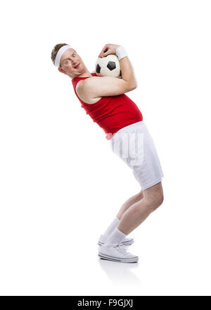 Funny clumsy football player with a ball. Studio shot on white ...