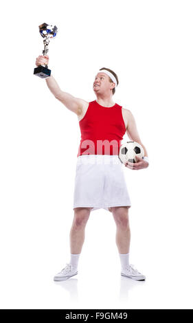 Funny clumsy football player with a ball. Studio shot on white ...