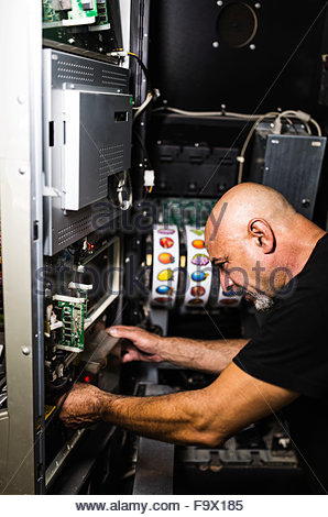 Slot Machine Technician Stock Photo: 12126310 - Alamy