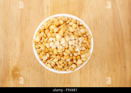 yellow daal on the wooden bckground Stock Photo - Alamy