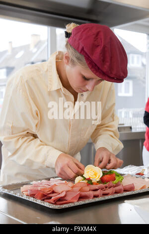 Larder cook prepare cold cuts Stock Photo - Alamy