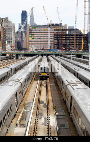 A MTA (Metropolitan Transportation Authority) maintenance crew work on ...