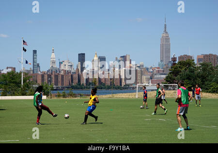 Soccer match in Bushwick Inlet Park in Williamsburg Brooklyn with East ...
