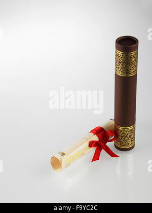 Graduation Certificate and Open Scroll Container On White Background ...