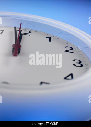 Time shows One Minute to 12 Stock Photo - Alamy