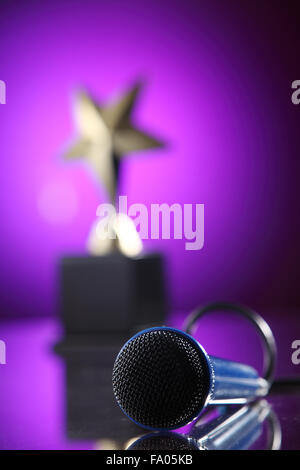 star shape trophy and microphone Stock Photo - Alamy