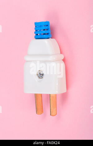 American Outlet Plug on pink background Stock Photo - Alamy
