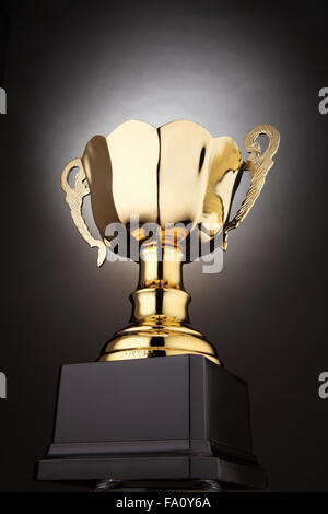 low angle of trophy with glow at the background Stock Photo - Alamy