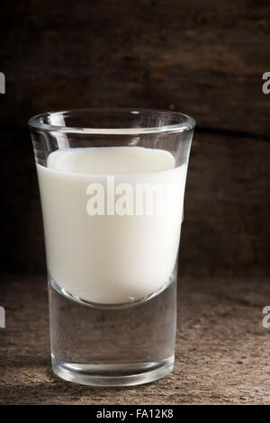 Dairy products on table standing in outdoor cowshed Stock Photo - Alamy