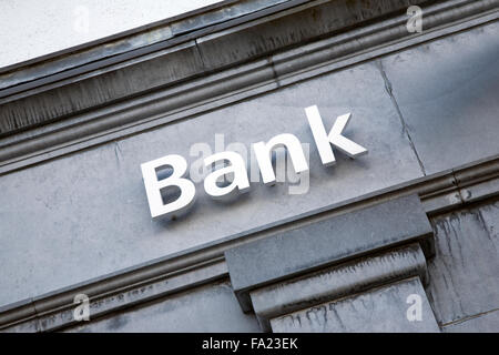 White Bank Sign on Grey Building Facade Stock Photo - Alamy