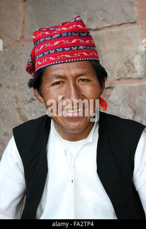 People of Taquile Island wearing traditional clothes, Lake Titicaca ...