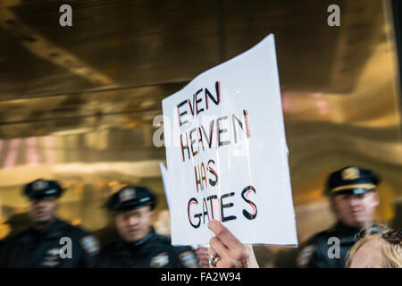 Pro-NYPD demonstrator holds a sign near New York City Hall, Wednesday ...