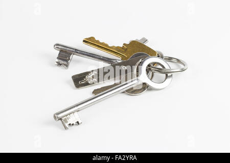 Six keys are photographed on a white background Stock Photo - Alamy