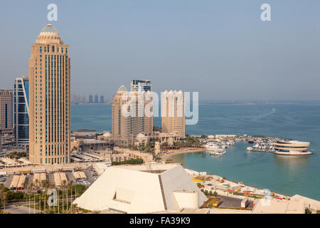 Qatar, Doha, West Bay, Beach and swimming pool of Hilton Hotel Stock ...