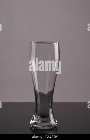 Clean tableware on dark background Stock Photo - Alamy