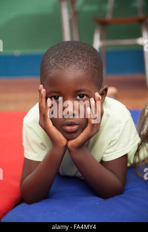 African child concentrated and little bit angry Stock Photo - Alamy