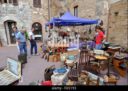 Antique flea market in Europe, Italy. Vintage items, photos. Background ...