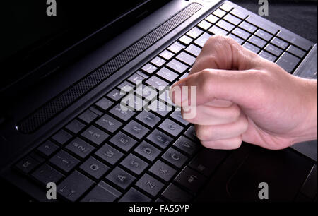 laptop computer being pounded Stock Photo - Alamy