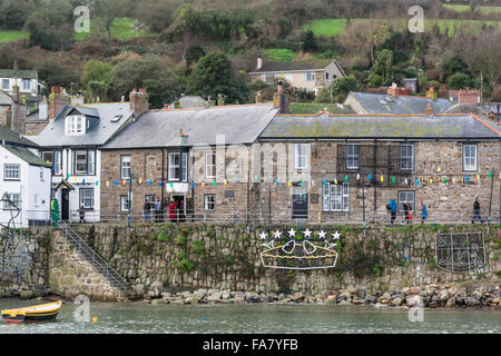 Mousehole, Cornwall, UK. 23rd December 2017. Tom Bawcocks Eve. The ...