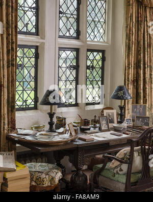 Anne Messel's desk beneath the window in The Library, Nymans, West ...