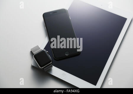 Electronics still life of three Apple devices, iPhone, iPad and Macbook ...