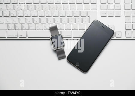 Electronics still life of three Apple devices, iPhone, iPad and Macbook ...