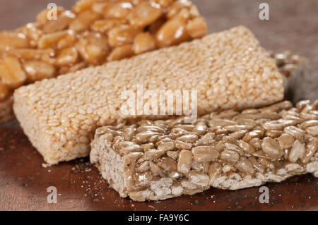 Brittle collection on a timber board, macro sho Stock Photo - Alamy