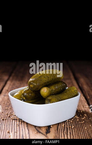 Preserved Gherkins (detailed close-up shot) on wooden background Stock ...