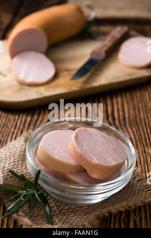 Portion of Baloney on rustic wooden background (close-up shot Stock ...