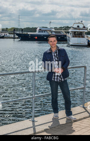 Young man at the Baltic sea Stock Photo - Alamy