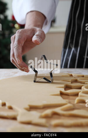 chef is taking a star shape cutter Stock Photo - Alamy