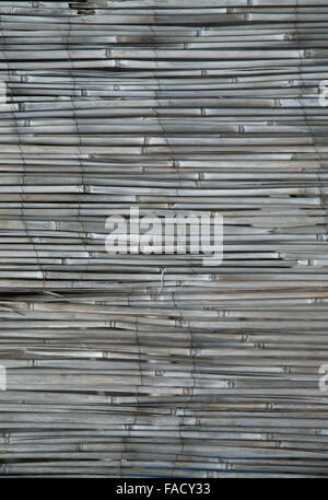 Bamboo screen of grey color Stock Photo - Alamy