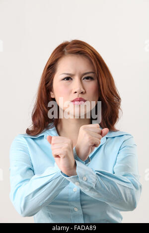 Reject gesture of business woman image on white background Stock Photo ...