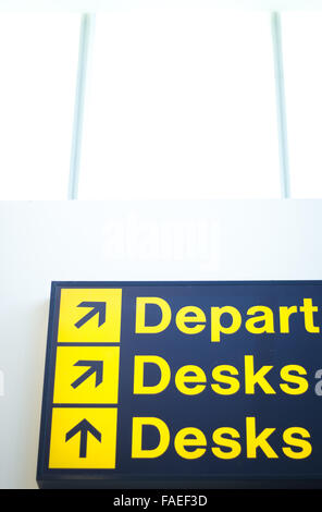 Airport desks information sign light panel giving directions in ...