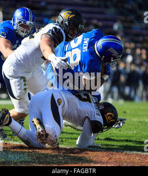Air Force running back Jacobi Owens, top, gets tackled by Abilene ...