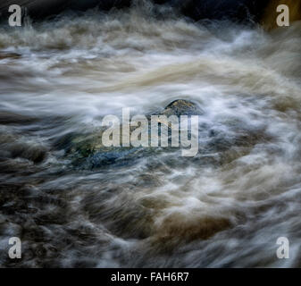 Water flowing and frothing Stock Photo - Alamy