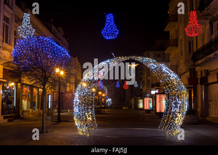 Christmas lights shaped as beautiful arch Stock Photo - Alamy