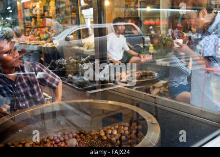 Roast chestnuts stall on South Bank, London Stock Photo - Alamy