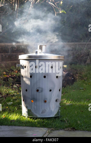 Burning rubbish in a garden incinerator Stock Photo - Alamy