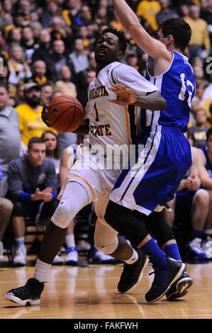 Drake guard Reed Timmer drives to the basket past Iowa guard Jordan ...