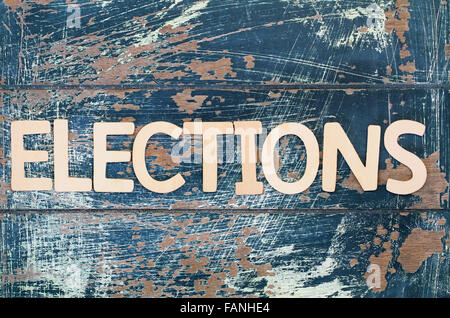 elections text written on blue-black grungy stamp sign Stock Photo - Alamy